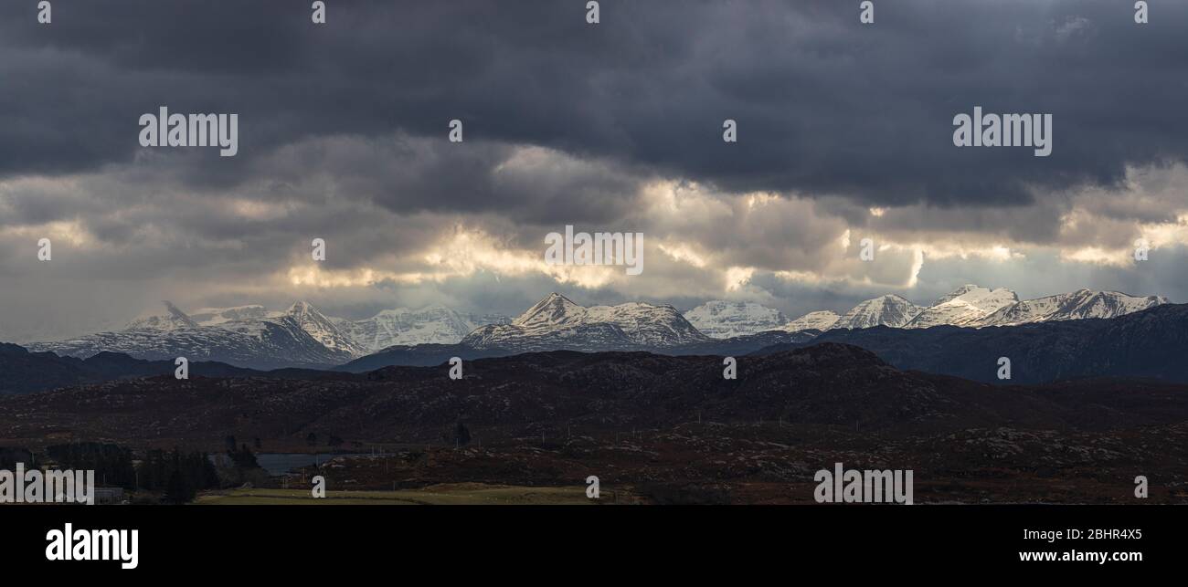Dramatic light and stormy clouds over mountains in the Scottish ...