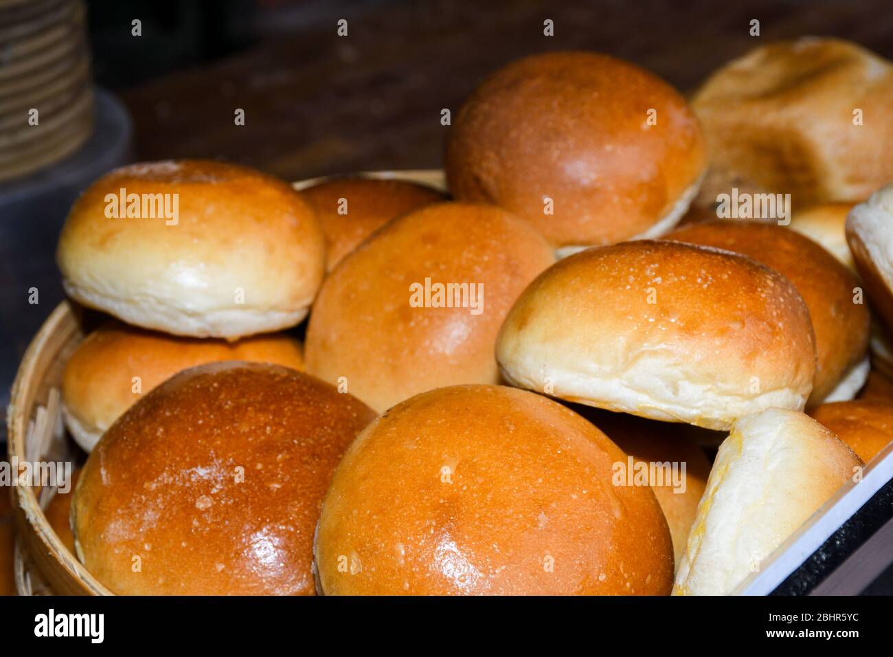 Golden burger buns for sale at the market Stock Photo - Alamy