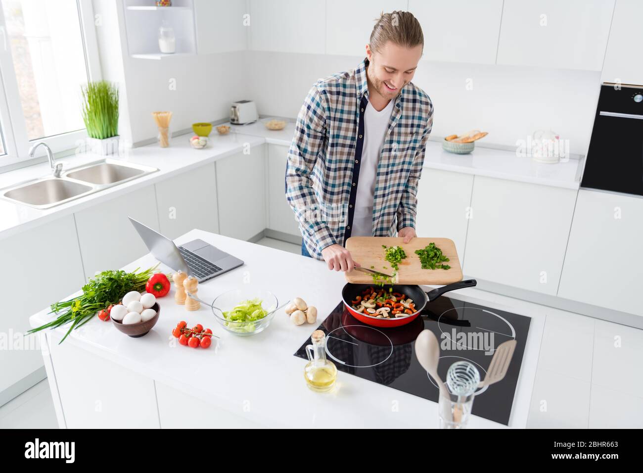 Portrait of positive guy chef have cooking hobby prepare dinner supper ...