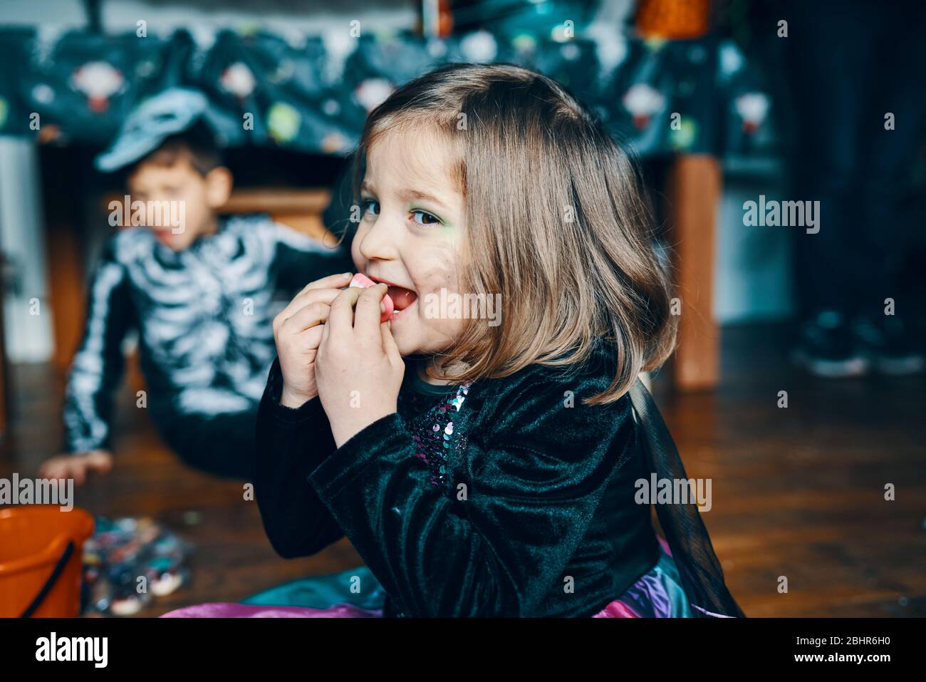 Skeleton costume and eating hi-res stock photography and images - Alamy