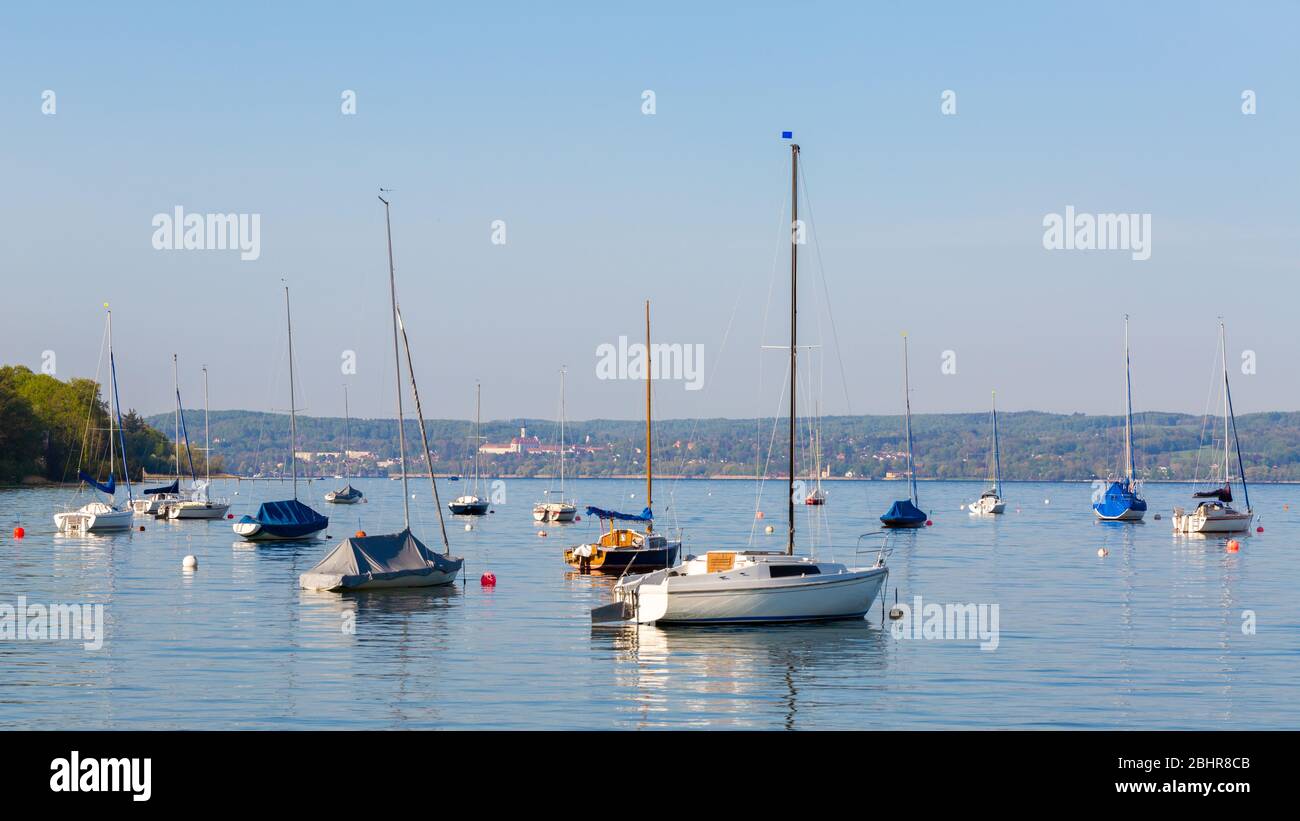 Panorama with anchoring sailboats at Lake Ammer (Ammersee). Some ...