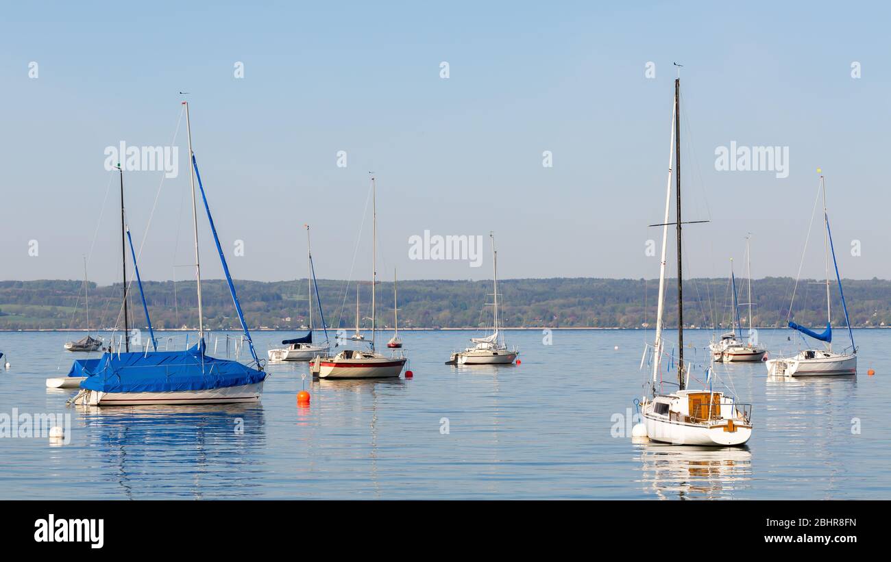 Panorama of sailboats at Lake Ammer (Ammersee). Sailing small yachts is ...