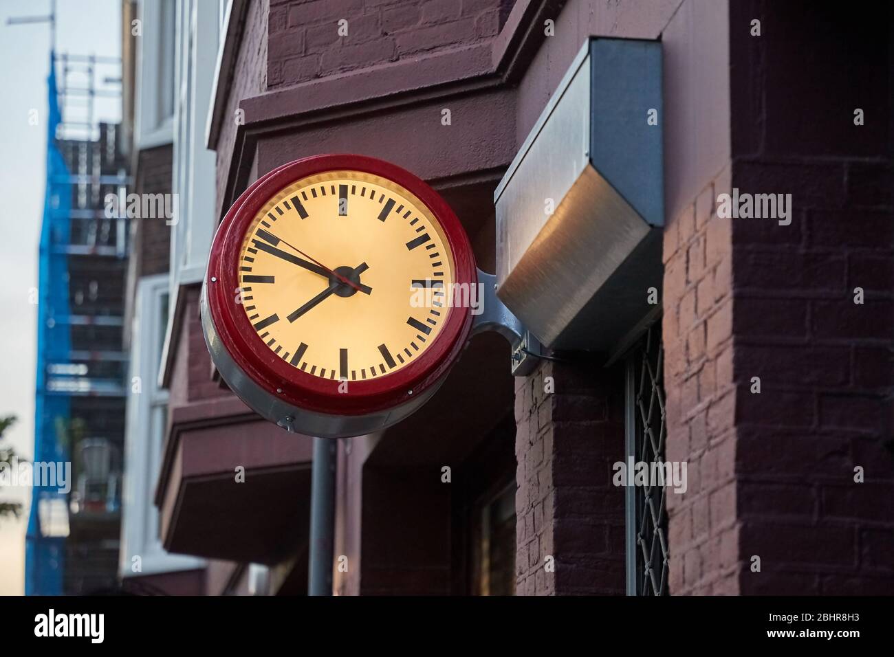 Clock at a Station Stock Photo - Alamy