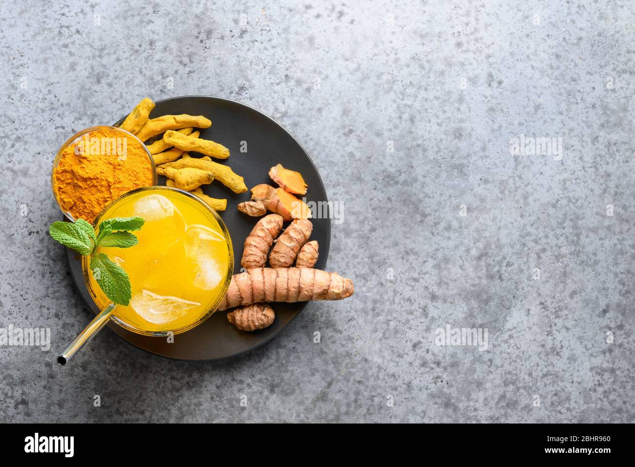 Golden milk turmeric iced freshness latte garnish mint sprig. Ayurvedic ...