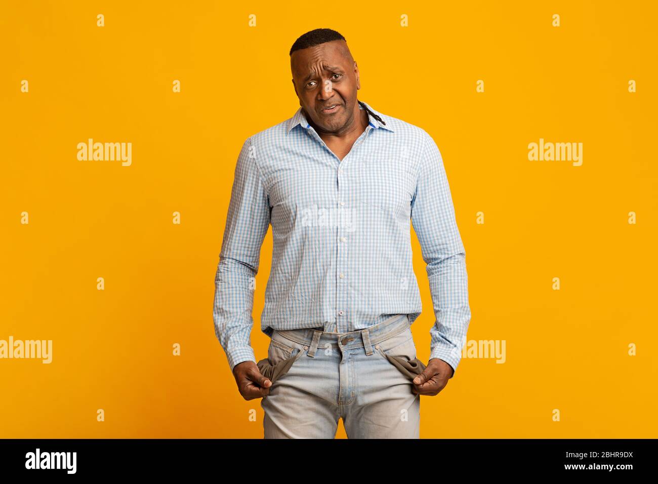 African american businessman empty pockets hi-res stock photography and ...