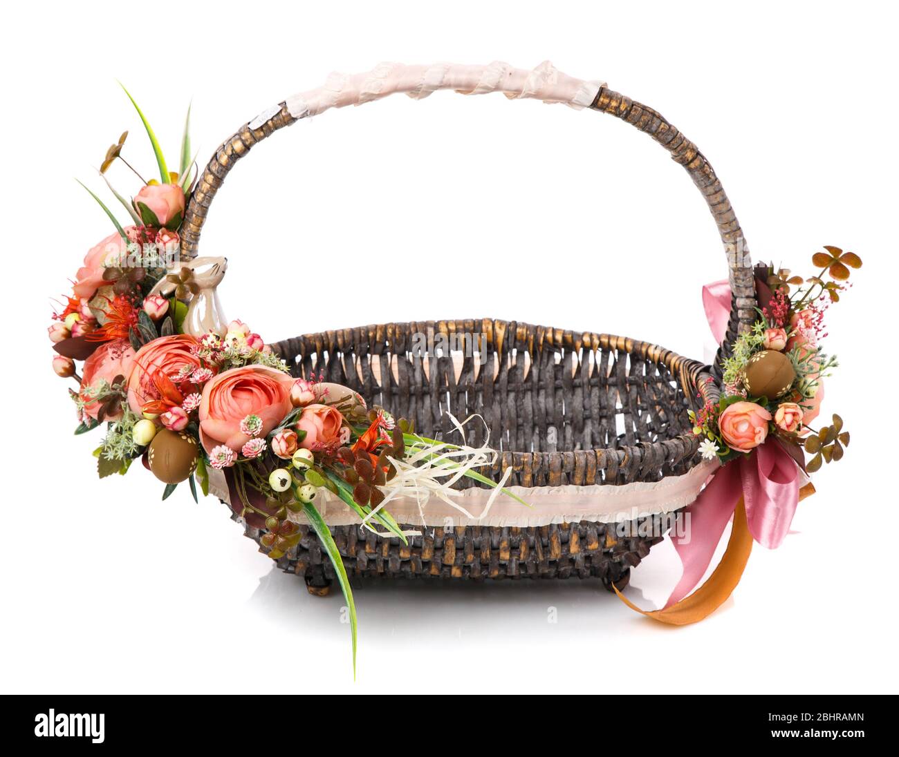 Beautiful flower arrangement on original brown wicker basket. Floral ...