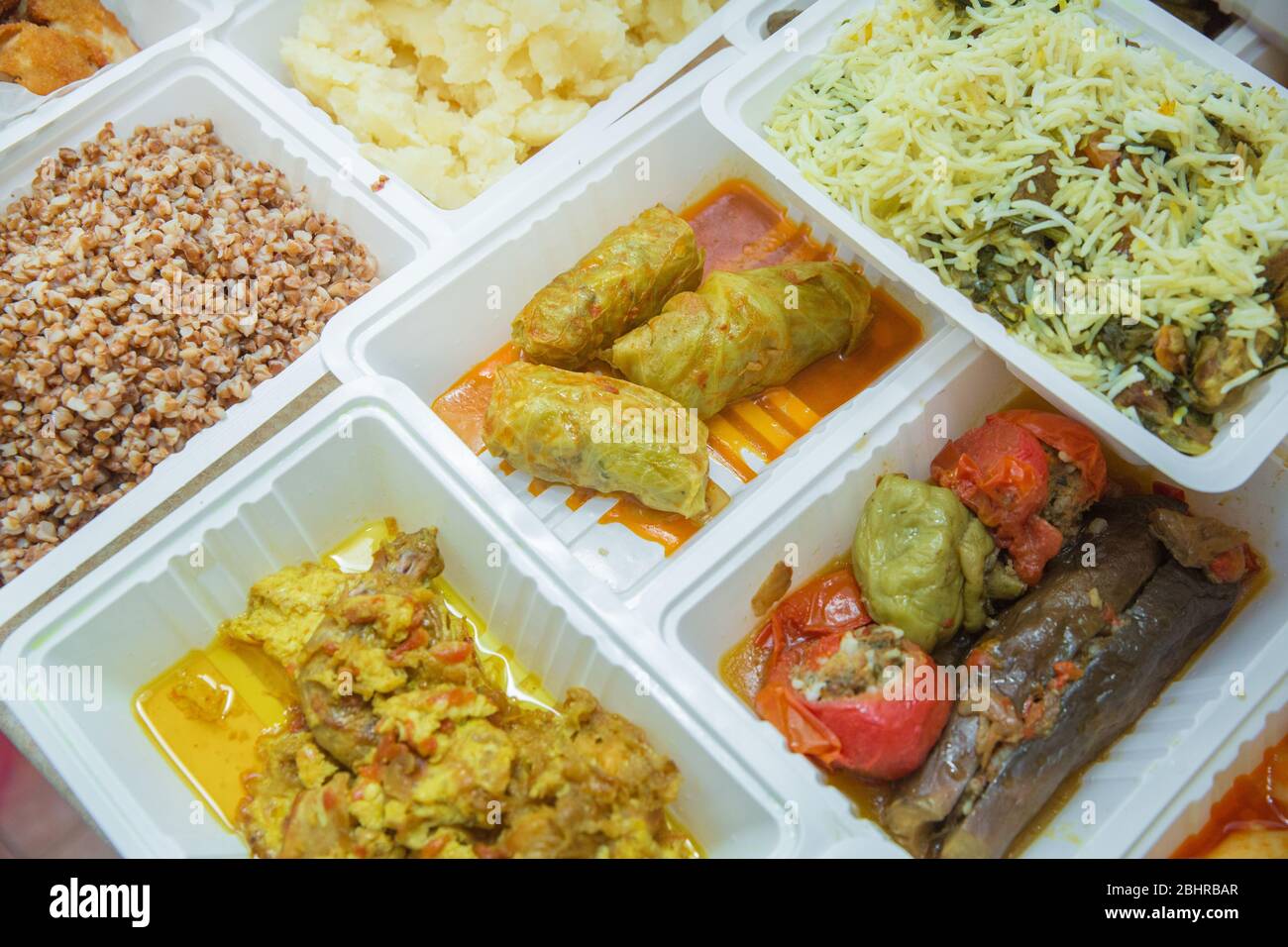 Delivery sets of healthy and delicious food in boxes . A variety of ...