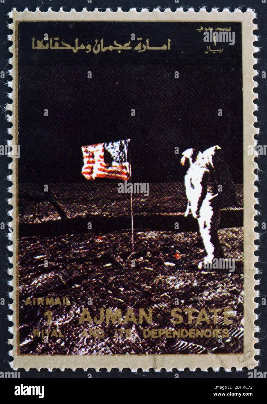 AJMAN - CIRCA 1973: a stamp printed in the Ajman shows Edwin Buzz ...