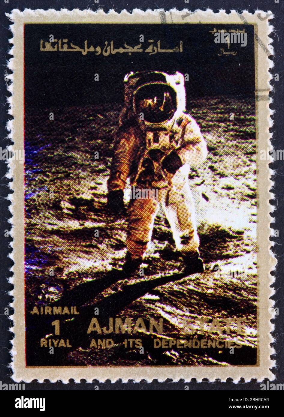 AJMAN - CIRCA 1973: a stamp printed in the Ajman shows Edwin Buzz ...