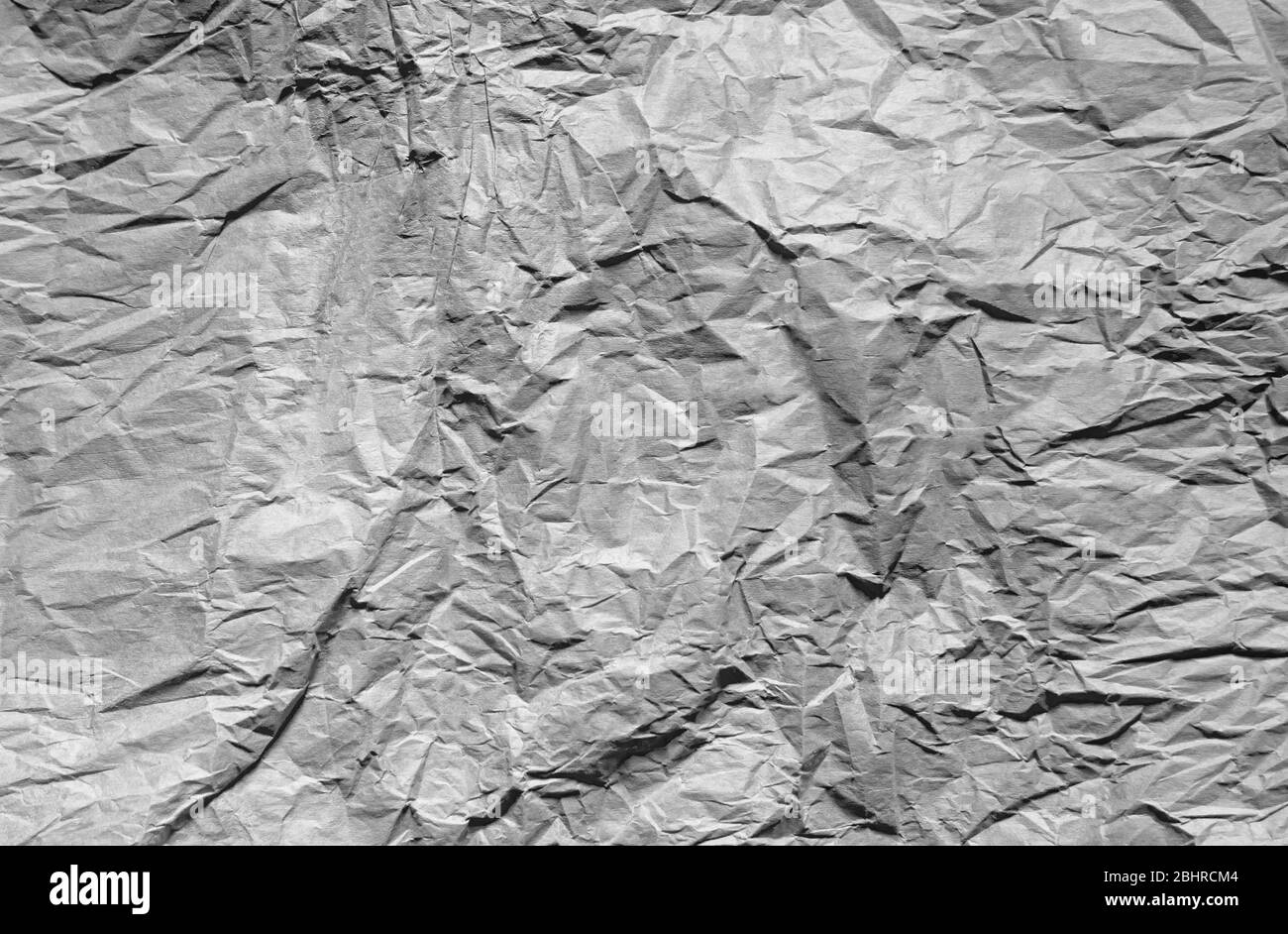 Abstract texture of crumpled paper, high contrast black and white ...