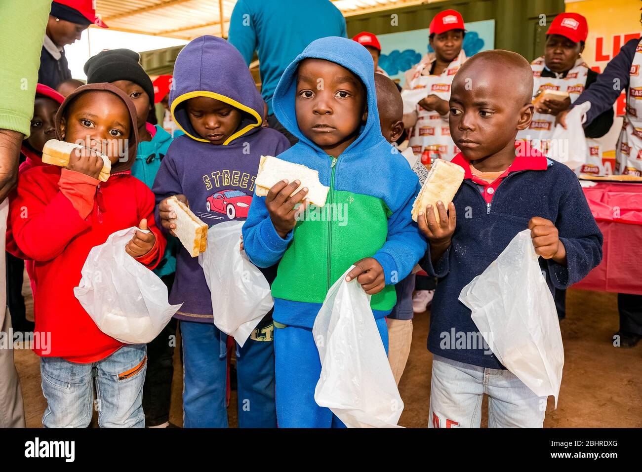 South africa children eating bread hi-res stock photography and images ...
