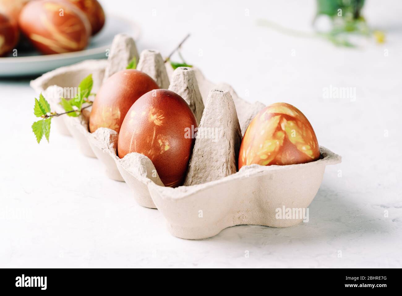 Naturally dyed with onion shells and springtime plants Easter eggs in ...