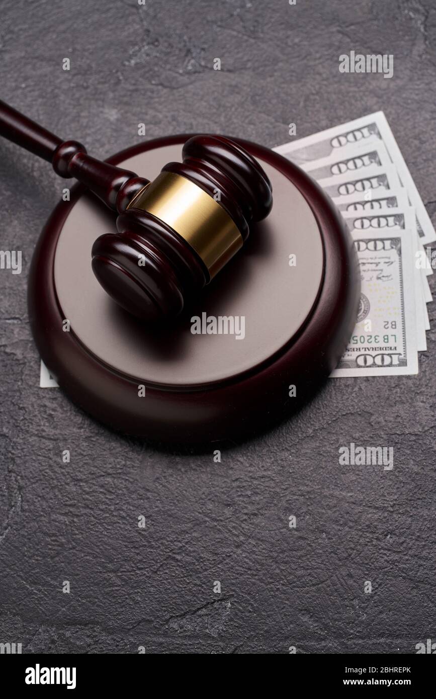 Symbol of court and justice, gavel, dollars on black surface Stock ...
