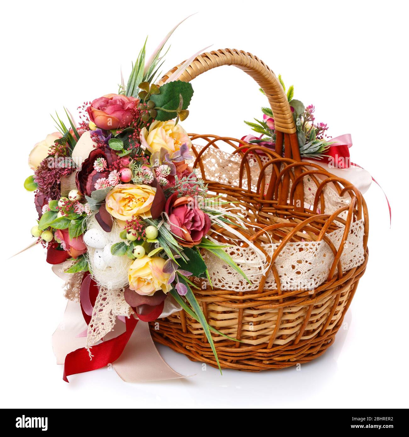 Wicker design baskets are decorated with a floral arrangement for ...