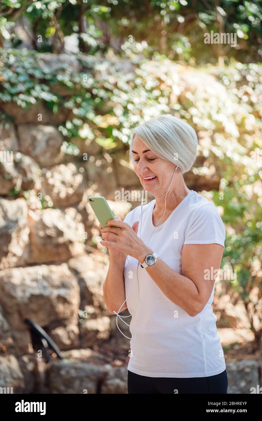 Senior woman runner hi-res stock photography and images - Alamy