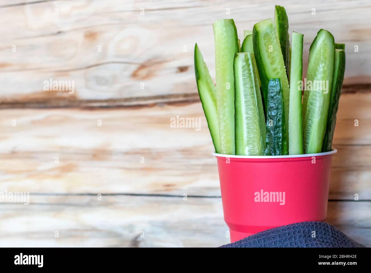 Chopped cucumber in a glass. Healthy food. Vegetable snack Stock Photo ...