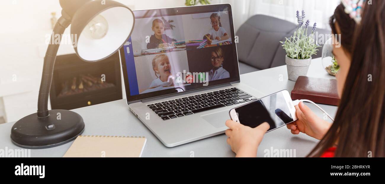 Remote lessons. The child smiles happily and gets knowledge remotely ...