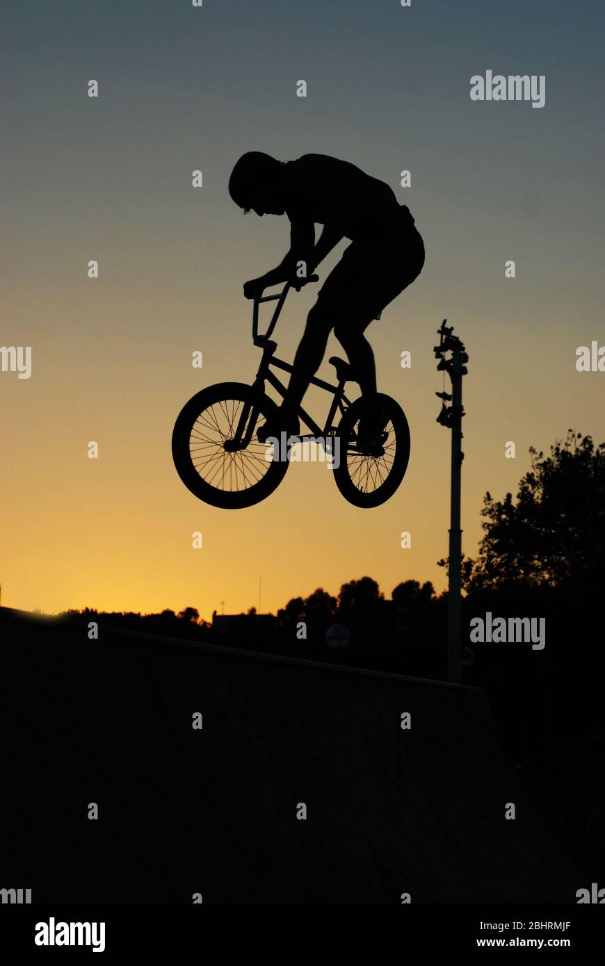 Photo-session of street stunt, jumping with bmx Stock Photo - Alamy