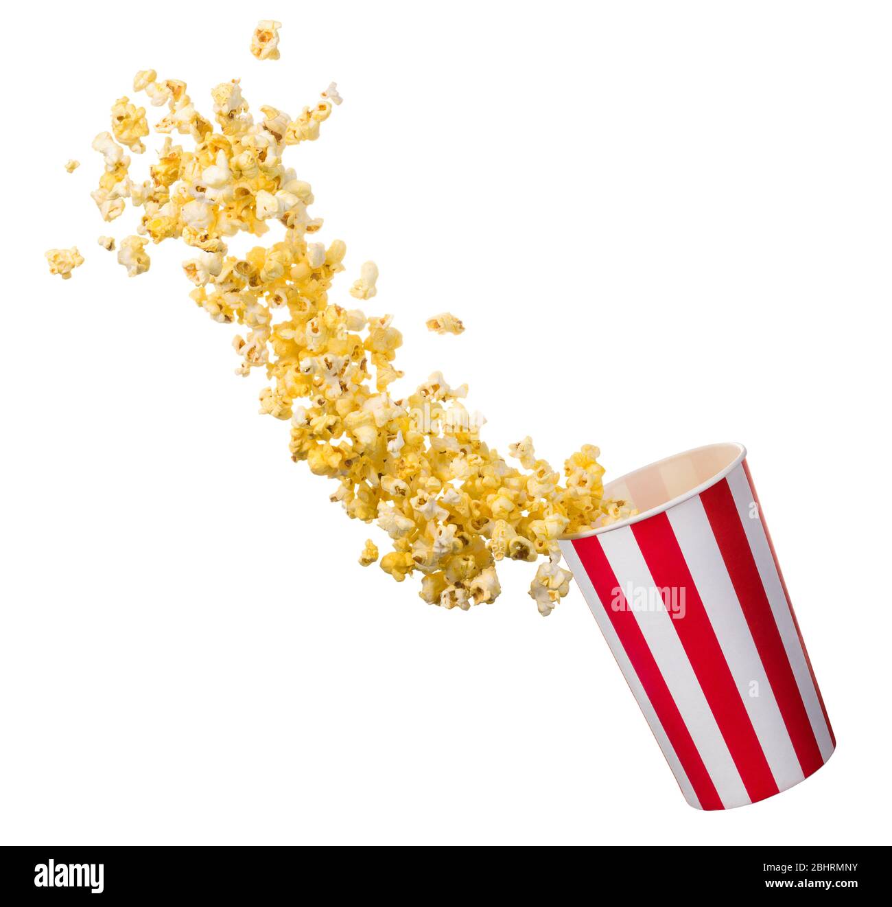 Flying popcorn from paper striped bucket isolated on black background ...