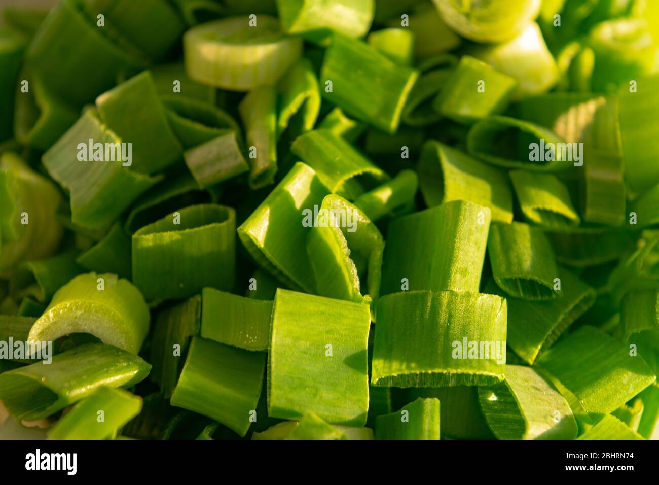 Sliced green onions, the texture of the surface. Close up. Background ...