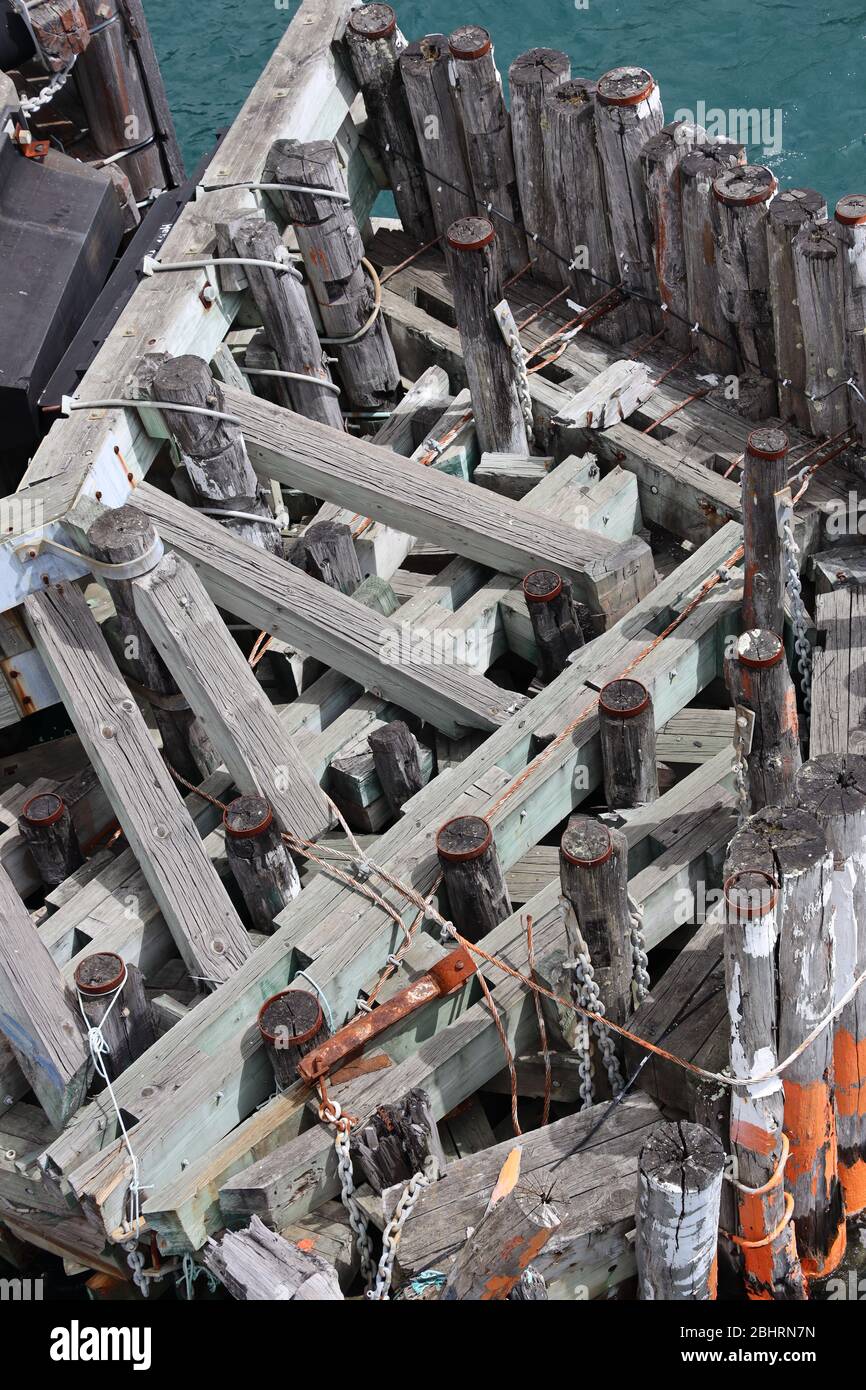 Fender in a ferry port. Abstract full of texture. Wooden protective ...