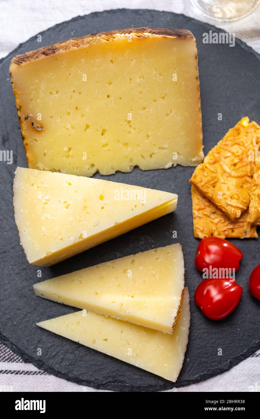 Spanish tapas, manchego cheese made from sheep milk and green olives ...