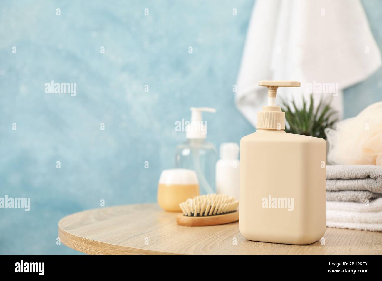 Bottle for liquid soap on wooden table. Personal hygiene concept Stock ...