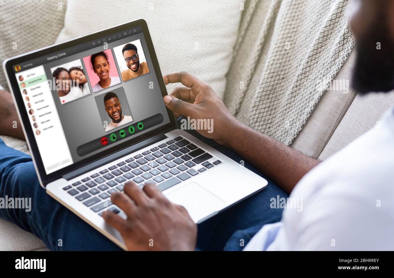 Lockdown communication. African American man having video conference ...