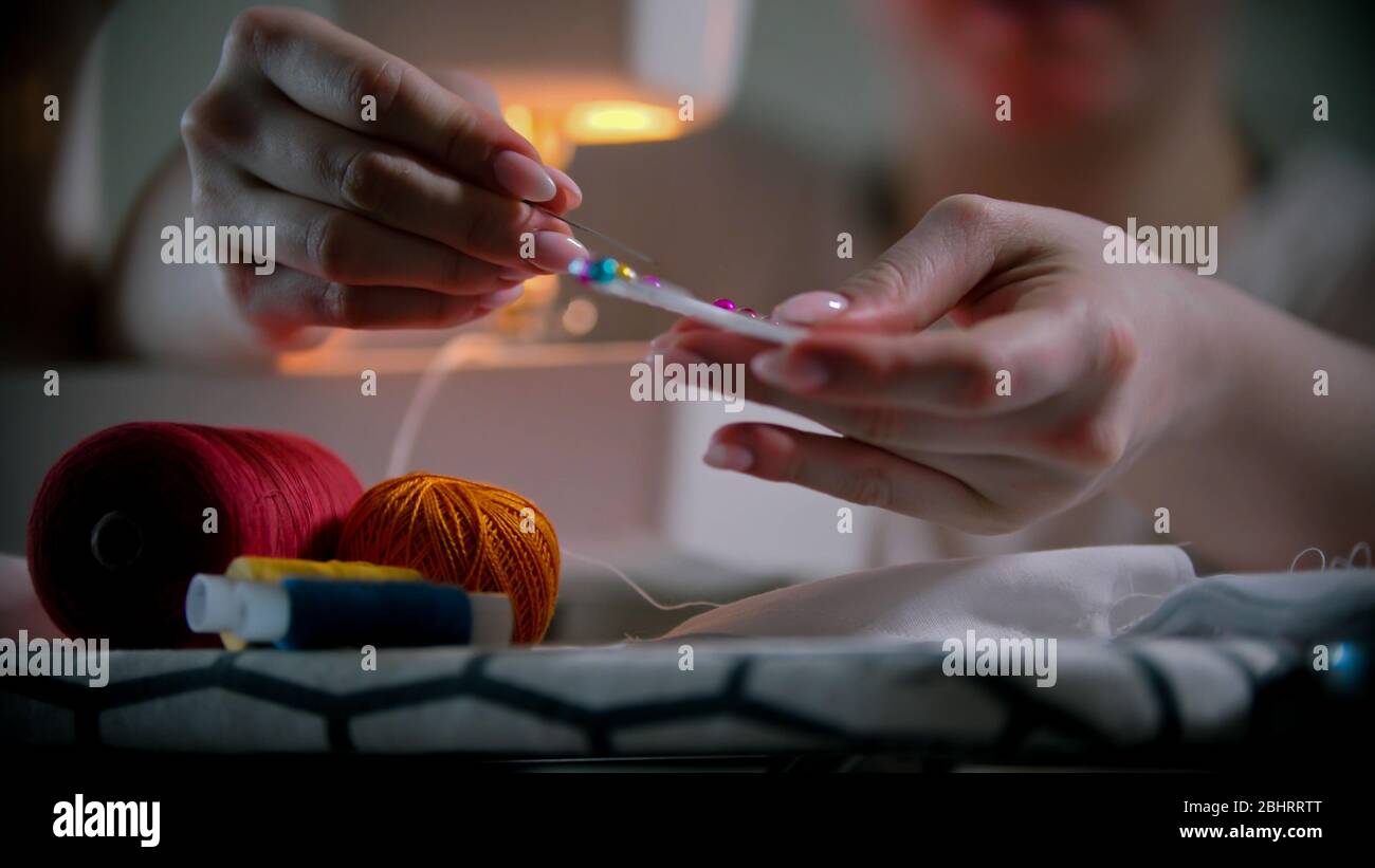 Young woman putting pins in hi-res stock photography and images - Alamy