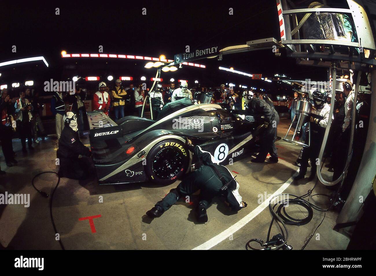 Bentley Speed 8 car number 8 on a night pit stop in the 2001 Le Mans 24 ...