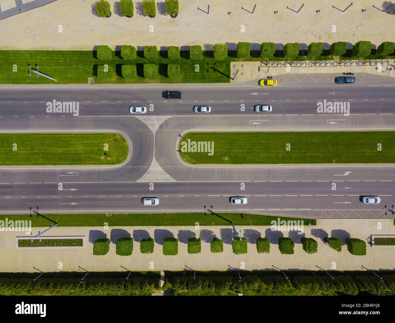Aerial view of the vehicular intersection, city traffic with cars on ...
