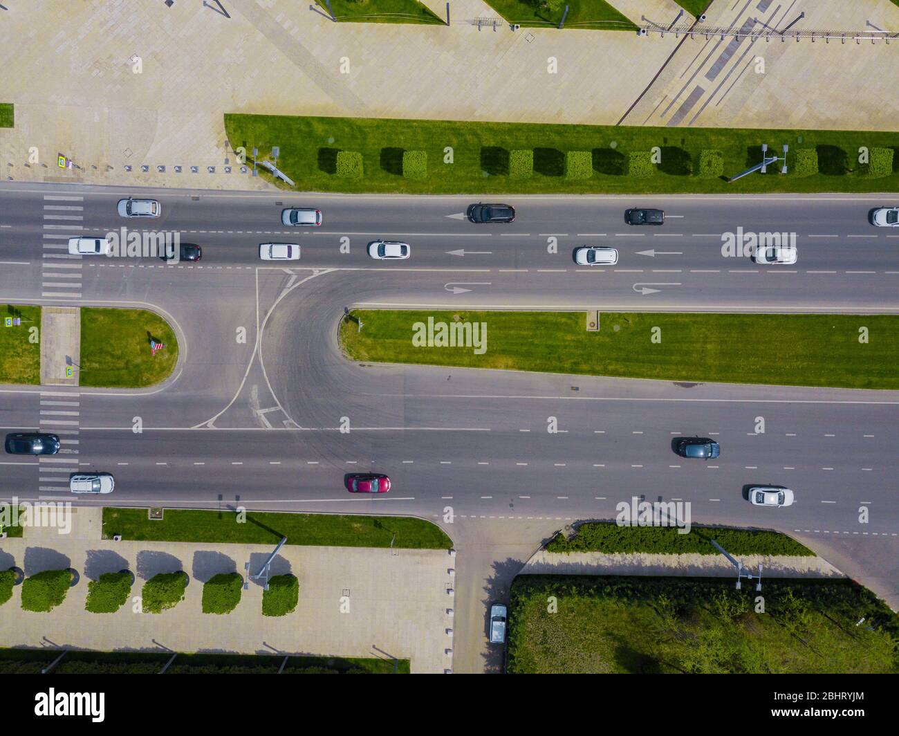 Aerial view of the vehicular intersection, city traffic with cars on ...