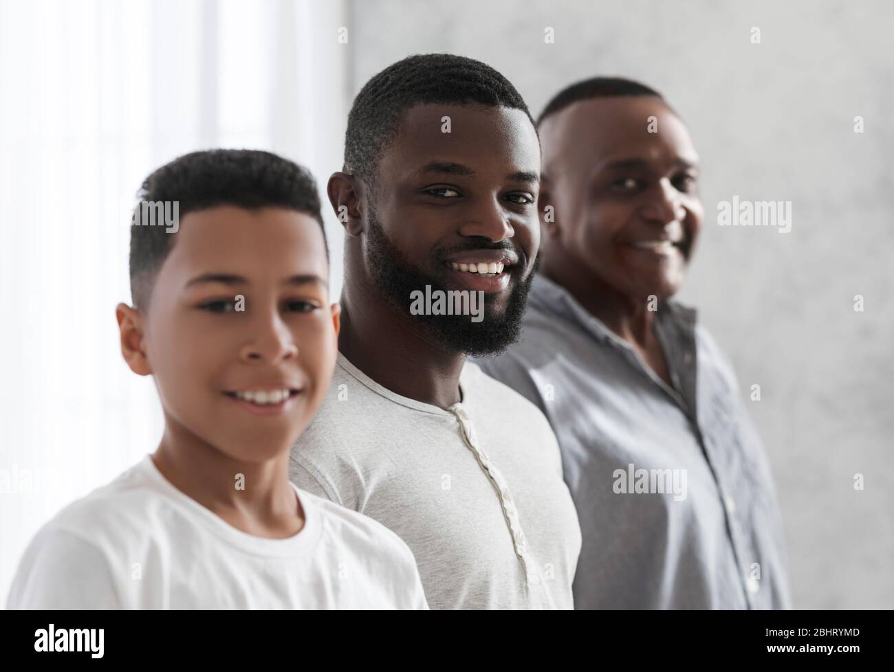 Generations standing together hi-res stock photography and images - Alamy