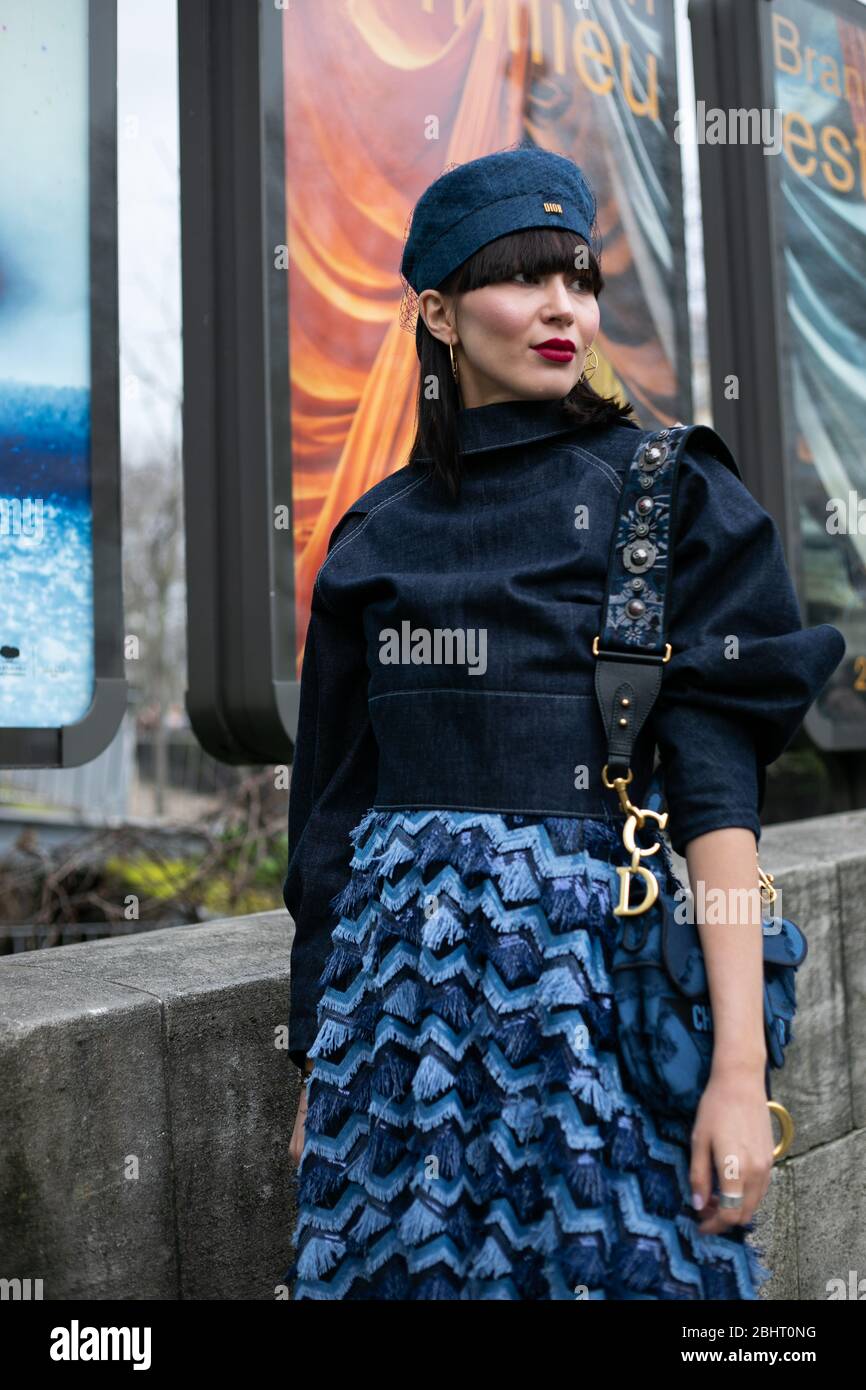 A chic showgoer attending the Victoria/Tomas show during Paris Fashion ...