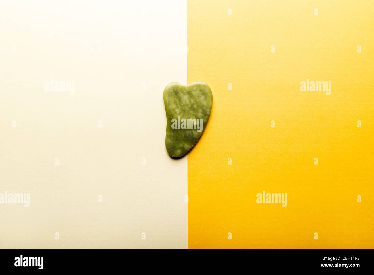 Gua sha stone Stock Photo - Alamy