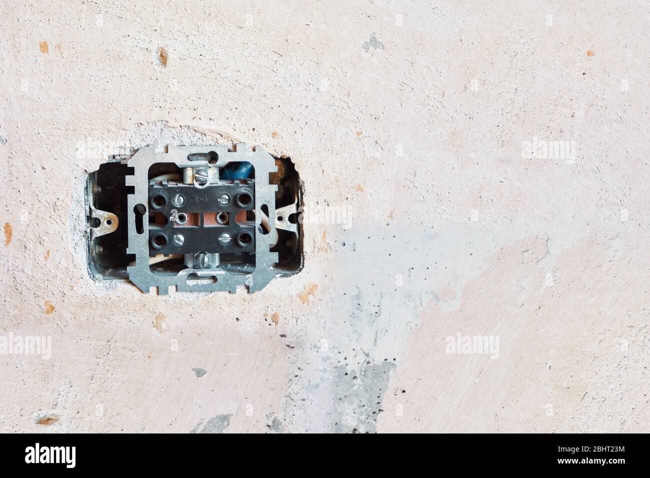 broken socket in concrete wall Stock Photo - Alamy