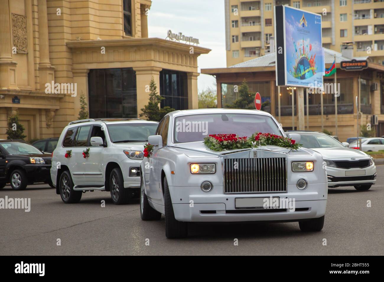 White luxury cars parked in luxury district near pretty houses at ...