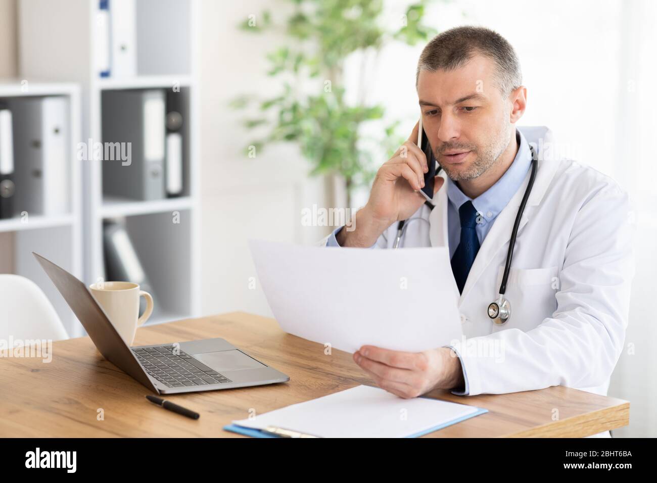 Doctor Calling High Resolution Stock Photography and Images - Alamy