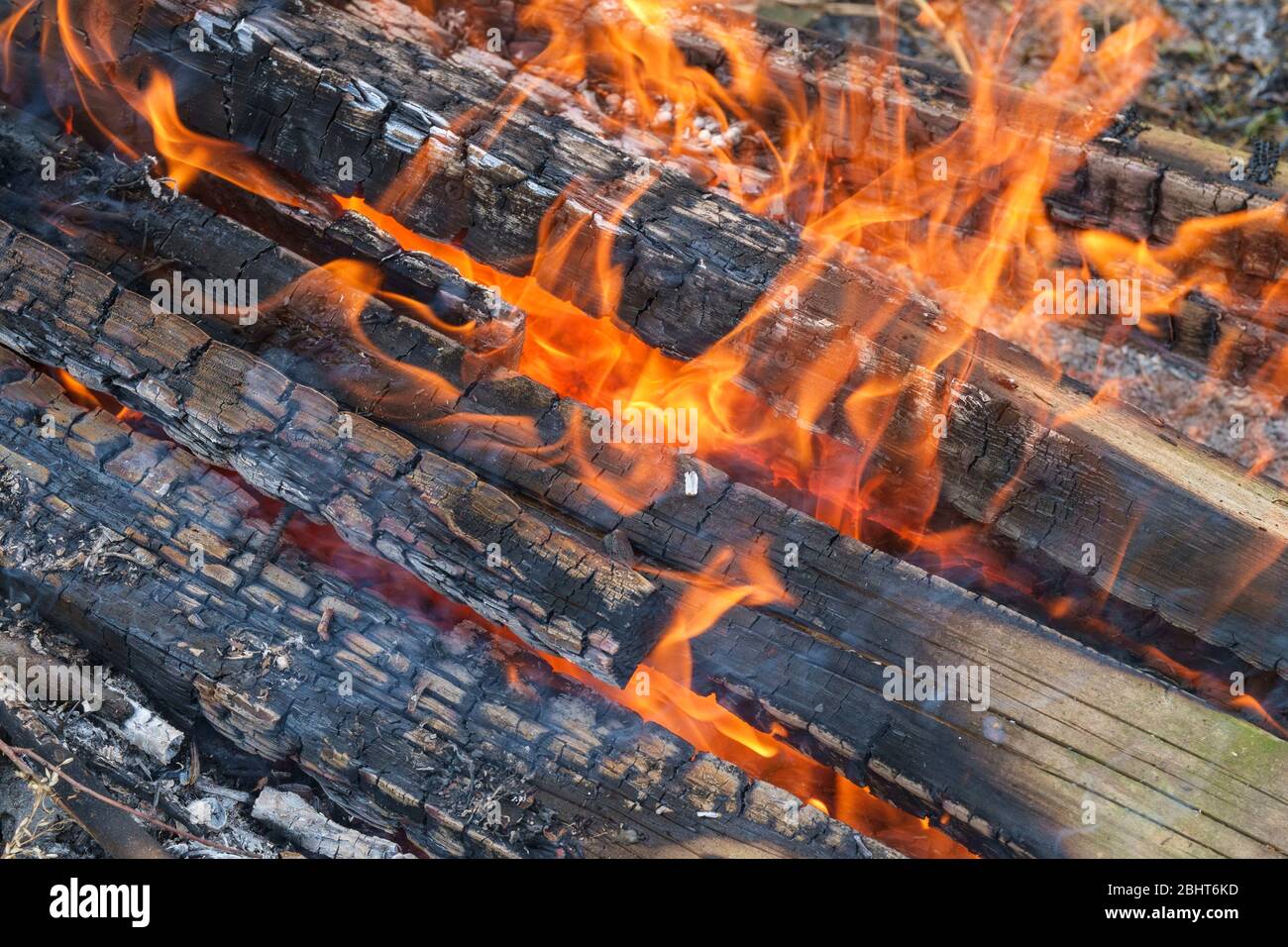 Wood burning on outdoor bonfire Stock Photo - Alamy