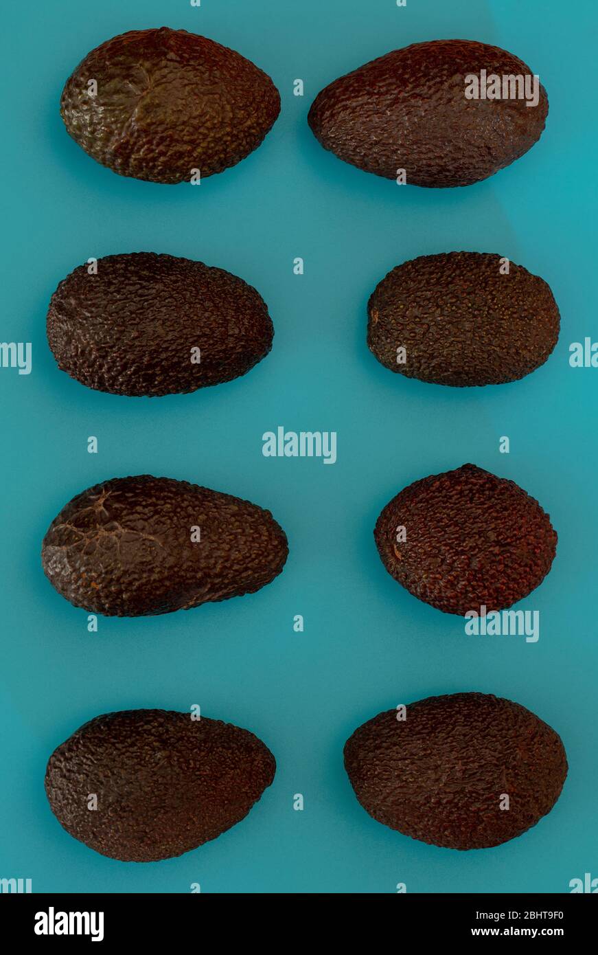 Group of avocado seen on a colourful background from above Stock Photo ...