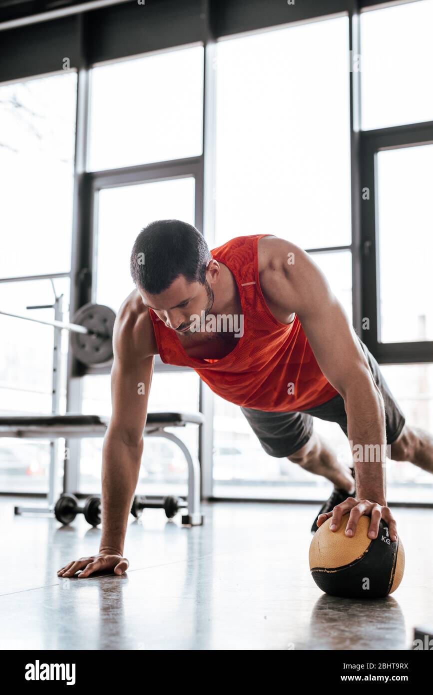 Strong sportsman doing plank hi-res stock photography and images - Alamy
