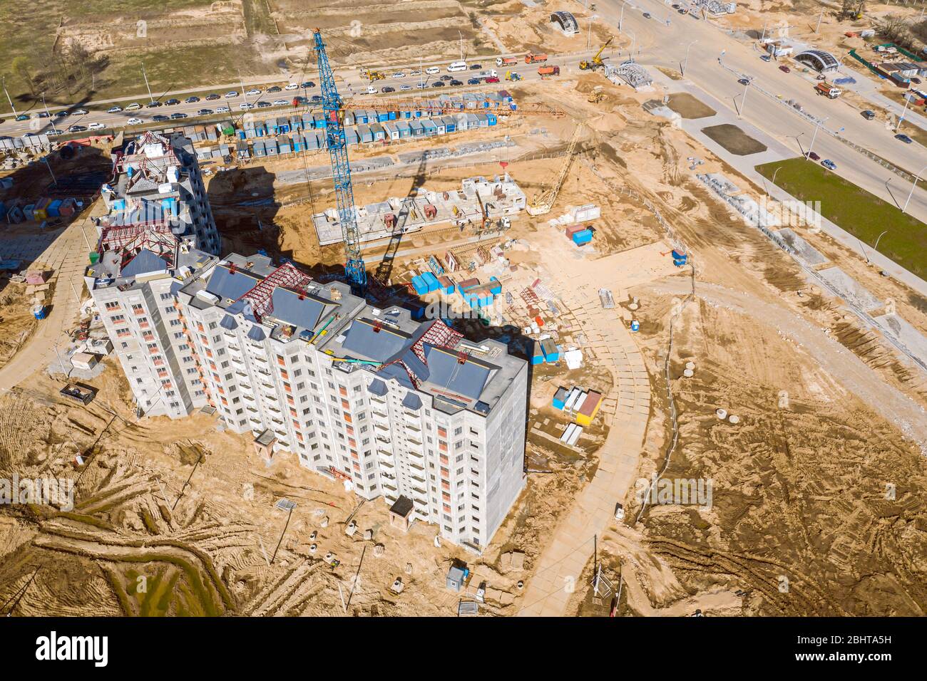 aerial view of construction site of new modern apartment building ...