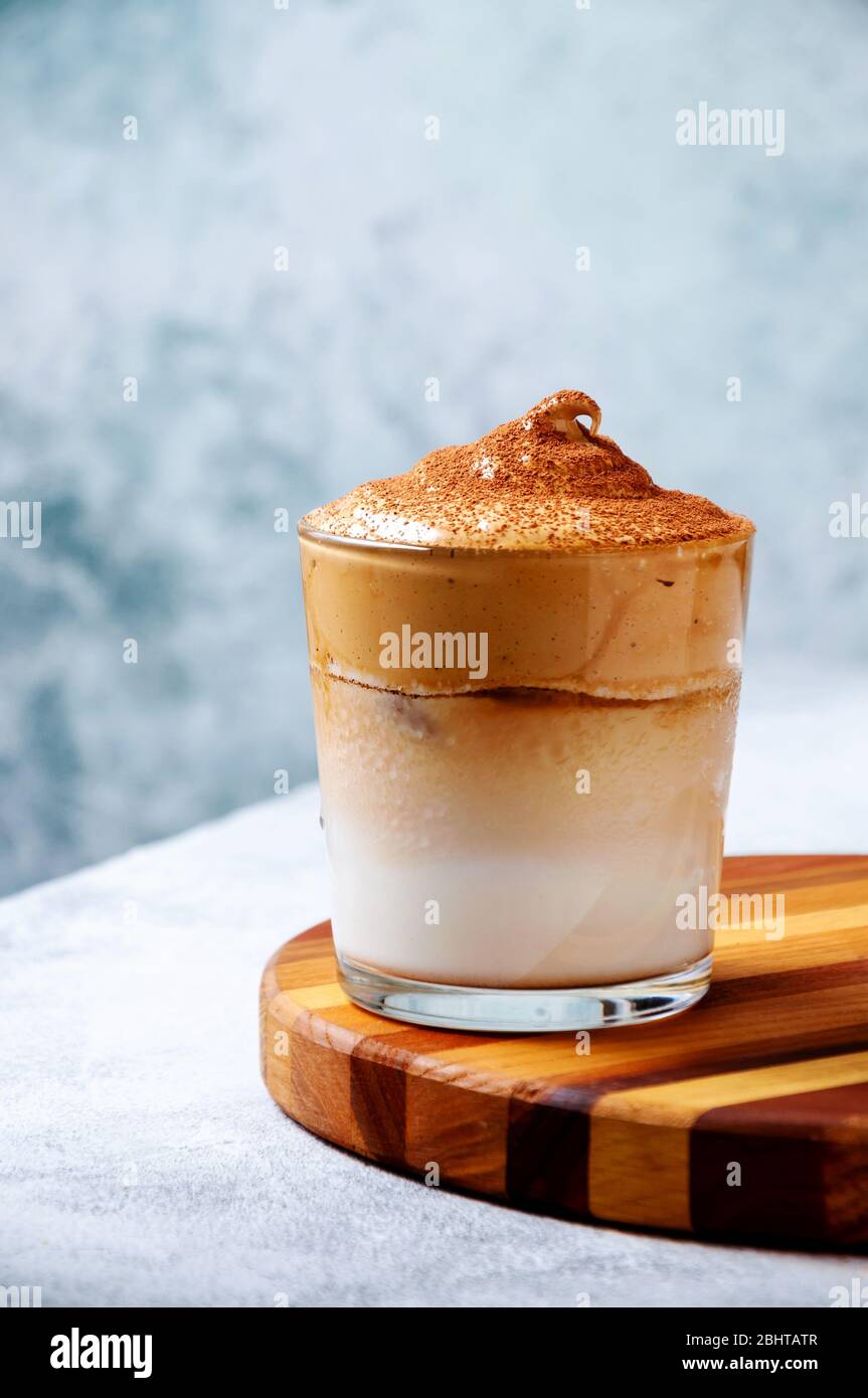 Iced Dalgona Coffee on Ligrht Background. Trendy Creamy Whipped Coffee ...