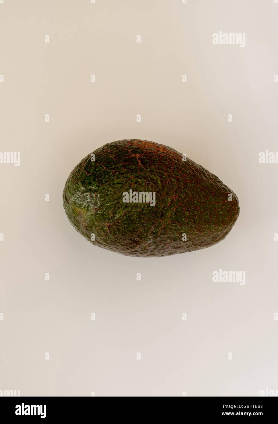 Single avocado seen from above against a colourful background Stock ...