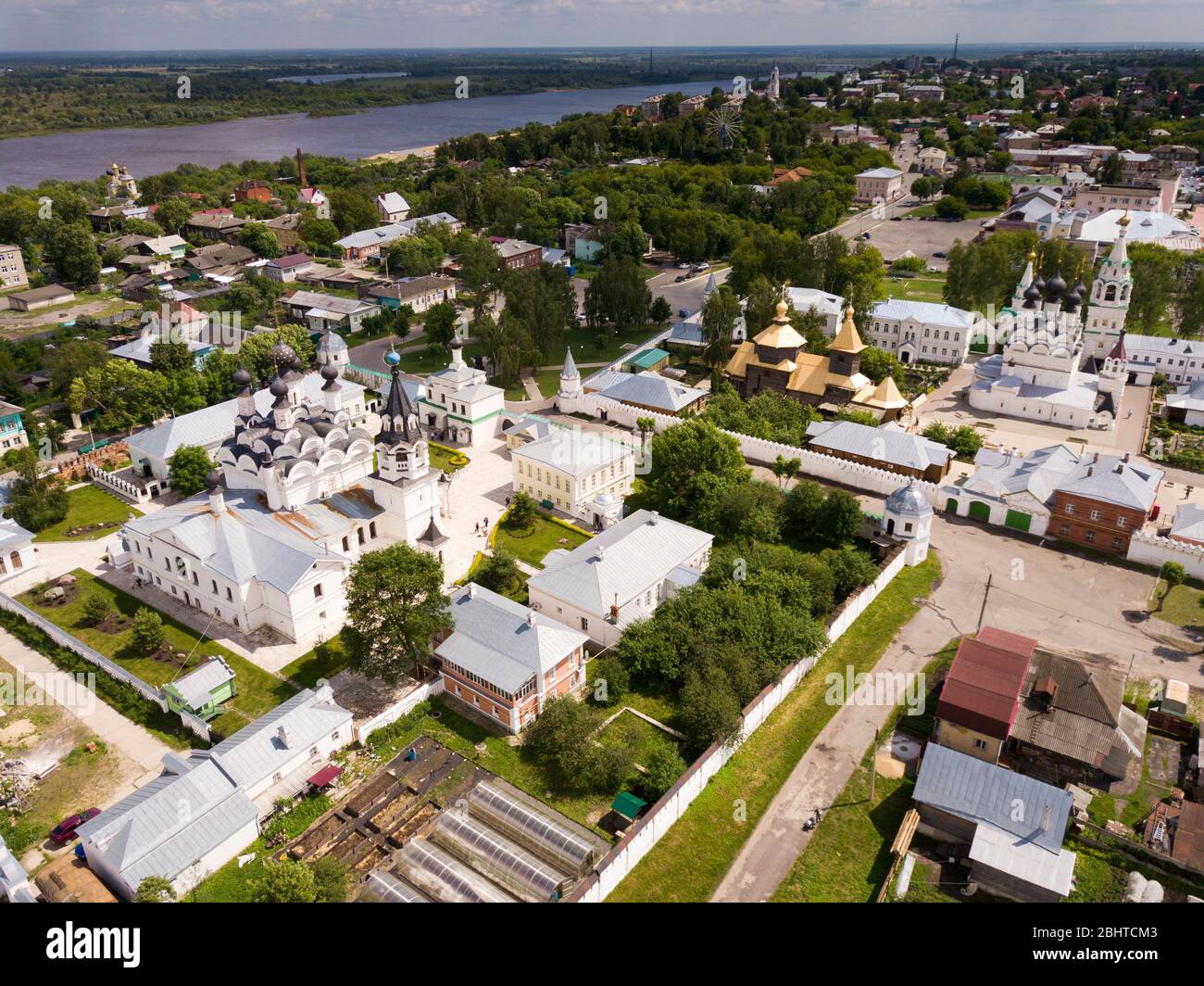 Aerial view of Russian city of Murom along bank of Oka River with ...