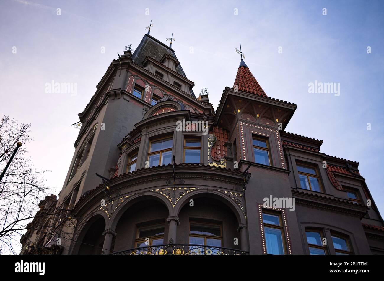 Old bohemian building with towers, spires and decorations (Prague ...