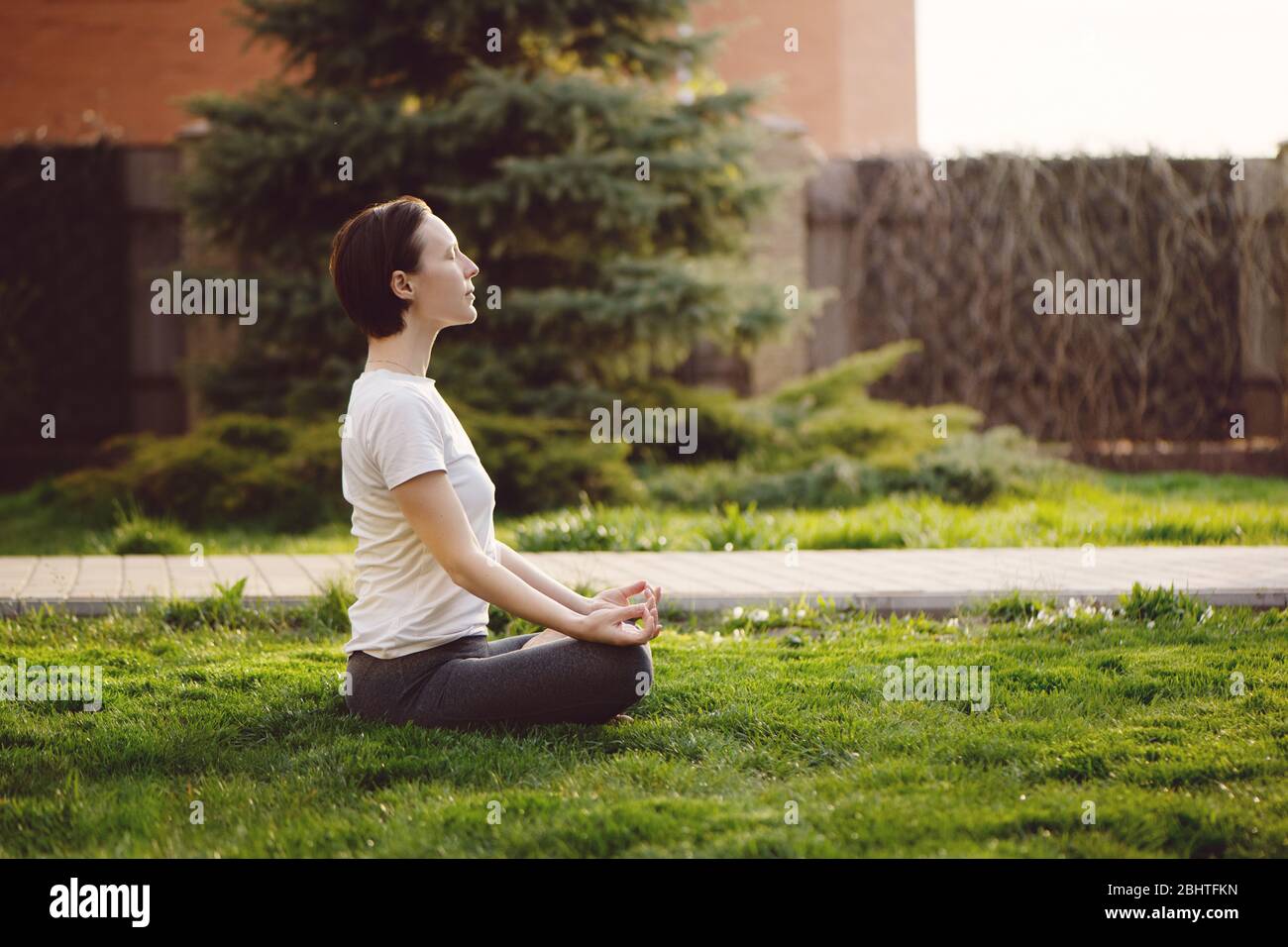 Beautiful woman in yard beautiful woman hi-res stock photography and ...