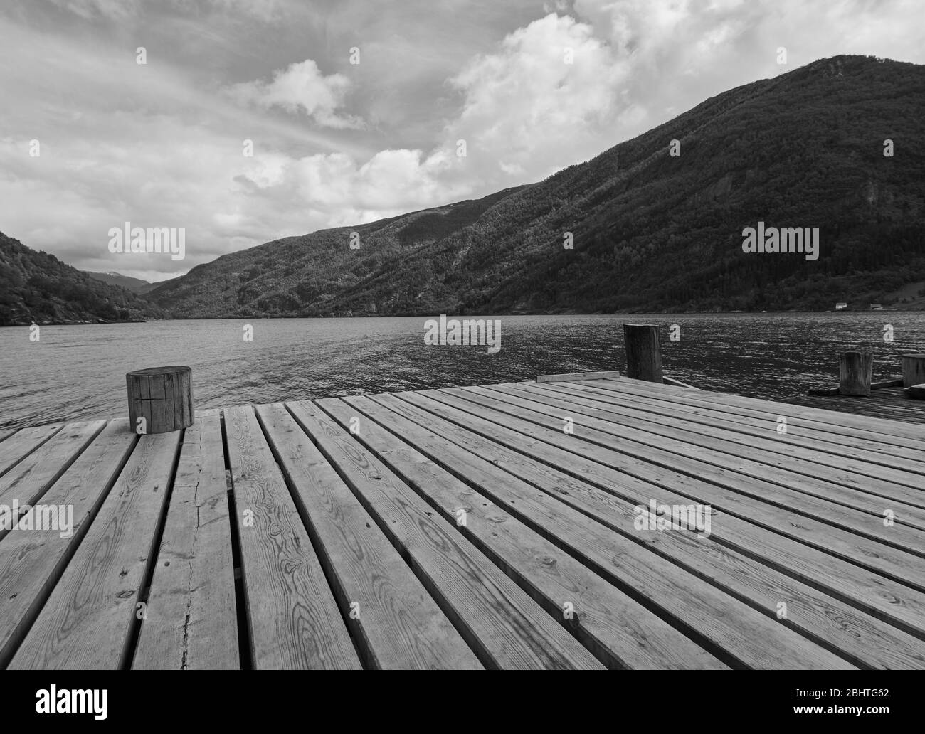 Wood on the lake Stock Photo - Alamy