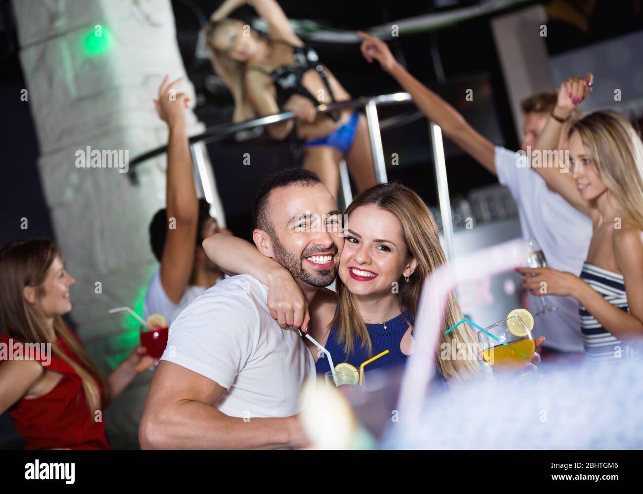 Girls hugging nightclub hi-res stock photography and images - Alamy