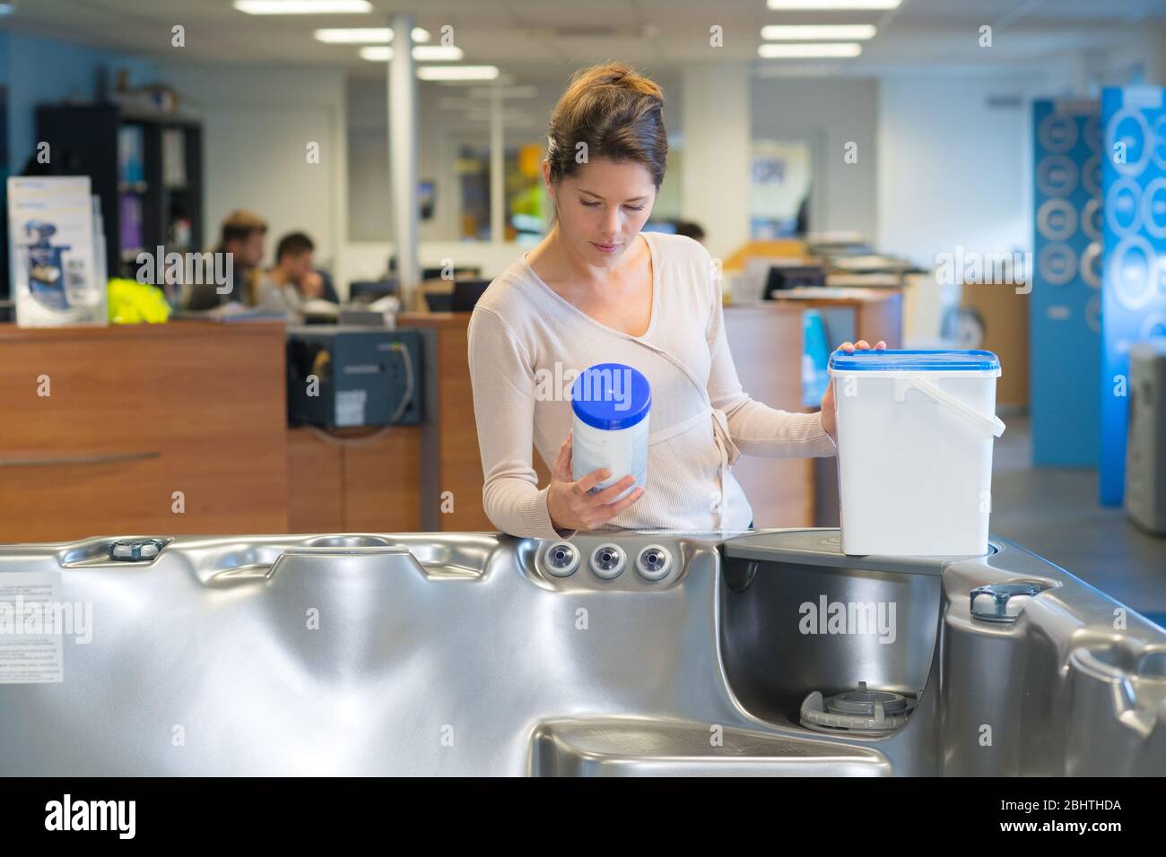 Woman reading a label hi-res stock photography and images - Alamy